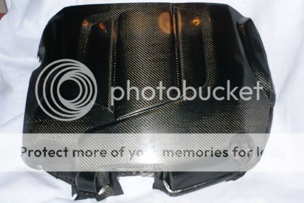 Pre preg (dry carbon) ISF Engine cover ...Mounted and working on ...
